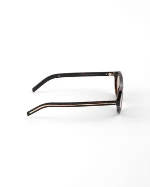 Prada Sunglasses With The Iconic Metal Plaque