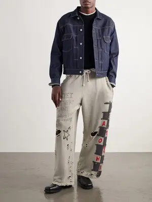 SATOSHI NAKAMOTO Get What I Want Printed Embellished Distressed Cotton-jersey Sweatpants