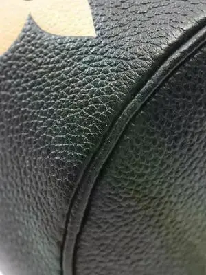 LOUIS VUITTON 2021-2026 Bicolor Monogram Empreinte Giant Papillon Bb Satchel