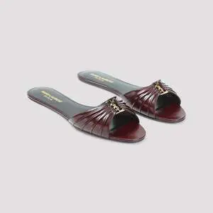 Saint Laurent Babylone" Glossed Leather Flat Sandals With Cassandre Logo