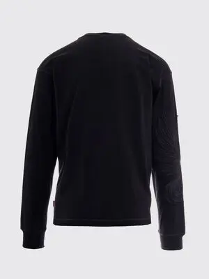 DIESEL® Crewneck Long-sleeved T-shirt In Cotton With Graffiti Logo Print - Black