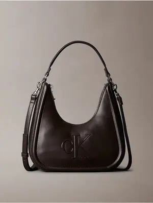Calvin Klein Embossed Monogram Crescent Bag - Delicioso