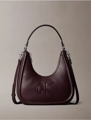 Calvin Klein Embossed Monogram Crescent Bag - Fudge