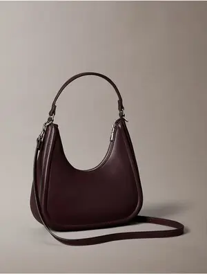 Calvin Klein Embossed Monogram Crescent Bag - Fudge