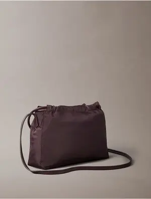 Calvin Klein Nylon Monologo Crossbody Bag With Drawstring Closure - Fudge