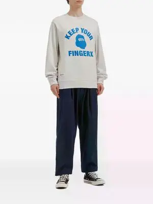 FINGERCROXX Pleated Logo-patch Trousers