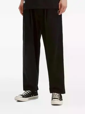 FINGERCROXX Logo-patch Pleated Trousers