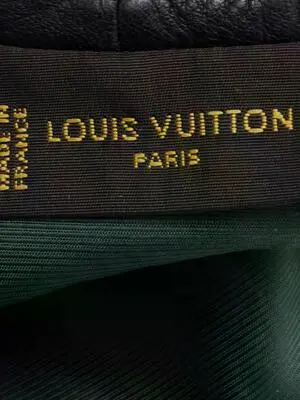 LOUIS VUITTON Silk Beret With Leopard Print And Logo Plaque