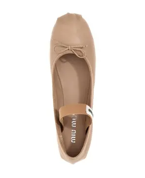 Miu Miu Logo-printed Bow Detailed Ballerina Shoes - Nude