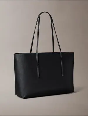 Calvin Klein Embossed Logo Zip Tote Bag - Black