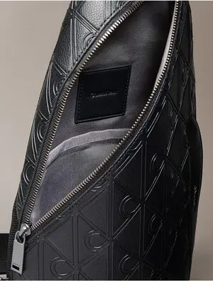Calvin Klein Debossed Allover Emblem Logo Sling Bag