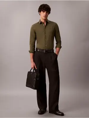 Calvin Klein Debossed Allover Emblem Logo Commuter Bag
