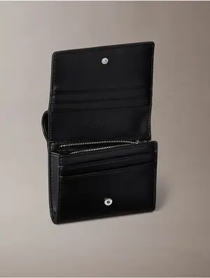 Calvin Klein Embossed Monogram Bifold Wallet - Black/white