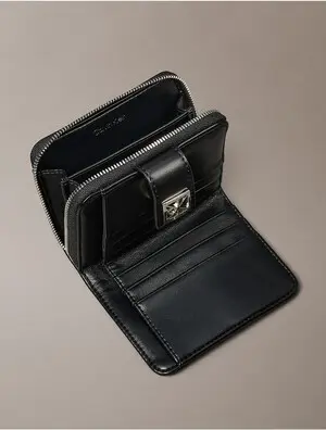 Calvin Klein Quilted Emblem Flap Zip Wallet