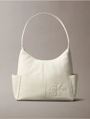 Calvin Klein Embossed Monologo Pocket Shoulder Bag - Light Hay