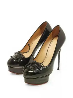 CHARLOTTE OLYMPIA Fringed Bow Platform Pumps