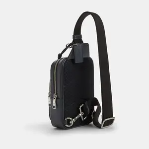COACH OUTLET Racer Sling Pack In Signature Canvas With Charms