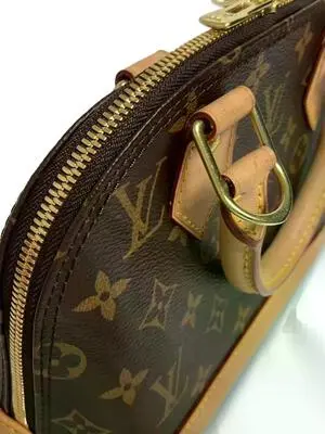 LOUIS VUITTON Monogram Alma Handbag - Brown
