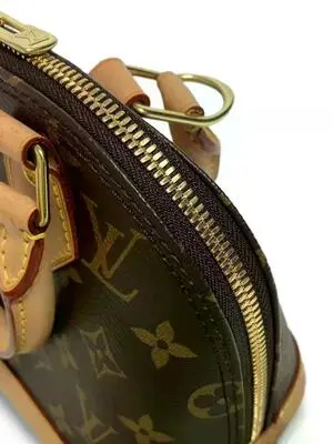 LOUIS VUITTON Monogram Alma Handbag - Brown