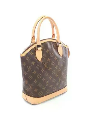 LOUIS VUITTON Monogram Lockit Vertical Handbag