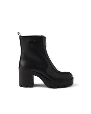 Prada Leather Ankle Boots With Zipper And Lug Sole