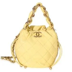 CHANEL Yellow Quilted Shiny Lambskin Chain Is More Mini Bucket Bag