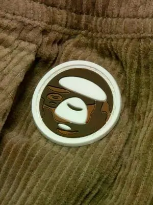 AAPE BY *A BATHING APE Moonface Logo Patch Corduroy Trousers