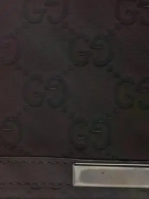 Gucci Guccissima Metal-bar Bifold Wallet