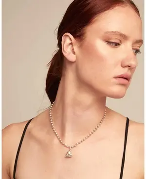 UNODE50 Sterling-plated Heart Charm