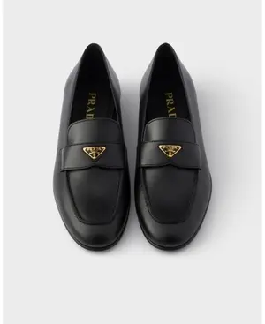Prada Leather Loafers With Metal Detailing