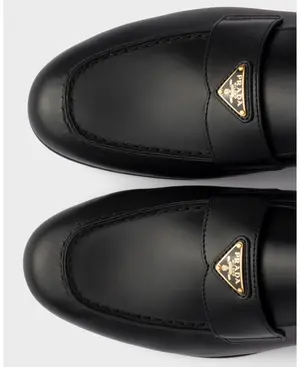 Prada Leather Loafers With Metal Detailing