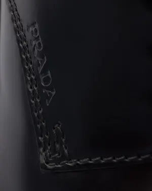 Prada Lace-up Sneakers With Embossed Logo