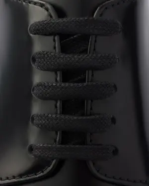 Prada Lace-up Sneakers With Embossed Logo