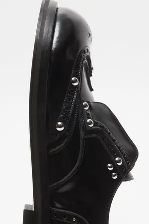 Acne Studios Wingtip Lace-up Shoes With Stud Detailing