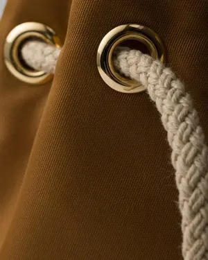 Prada Drawstring Clutch With Enamel Triangle Logo - Brandy