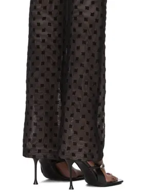 MISBHV Sheer Flocked Logo Mesh Trousers