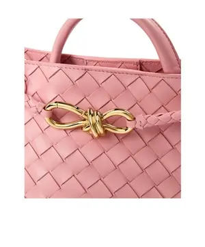 Bottega Veneta Woven Leather Handbag With Gold Knot Detail - Pink