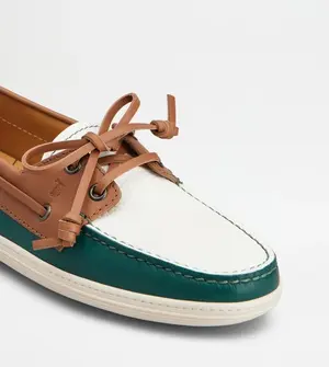 TOD'S Round-toe Loafers With Signature Embossed Pattern