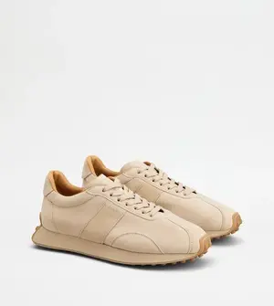 TOD'S Sneakers With Embossed Logo Detail