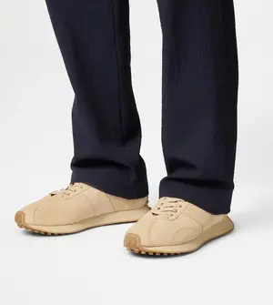 TOD'S Sneakers With Embossed Logo Detail