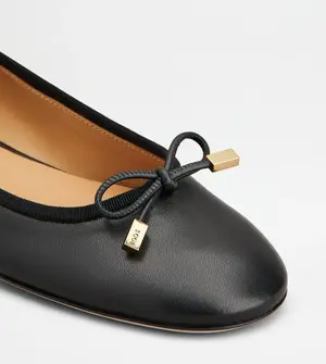 TOD'S Round Toe Ballet Flats With Bow Detailing