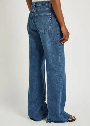 FRAME The Lax Distressed Flared-leg Denim Jeans