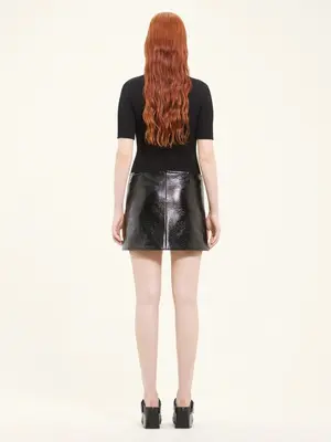 COURREGES Ac Ribbed-knit Polo Shirt