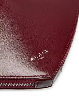Alaïa Heart-shaped Glossed Leather Cross-body Bag