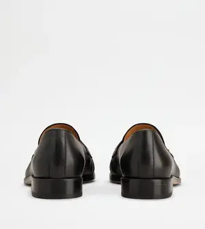 TOD'S Round Toe Loafers With Penny Strap Detail