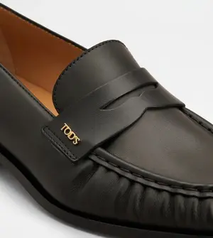 TOD'S Round Toe Loafers With Penny Strap Detail