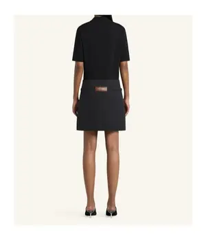 COURREGES Short-sleeved Merino Wool Polo With Embroidered Logo - Black
