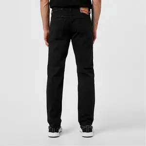 DIESEL® Tapered Jeans With Button And Zipper Closure