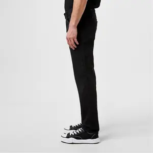 DIESEL® Tapered Jeans With Button And Zipper Closure