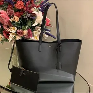 Saint Laurent E/w Logo Detailed Tote Bag